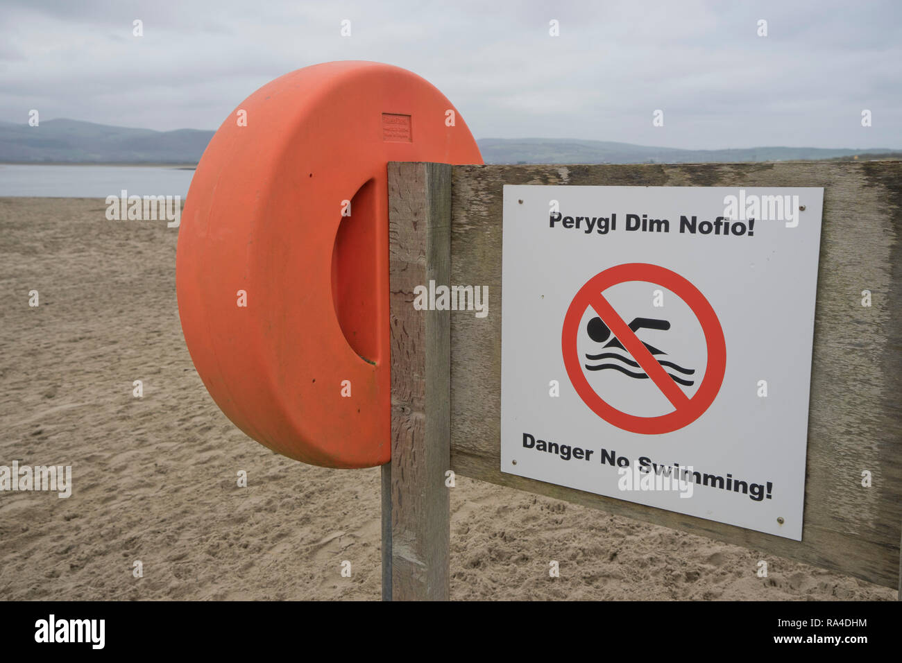 Bilingual Welsh-English signs on the beach in Ynyslas at the Dyfi ...