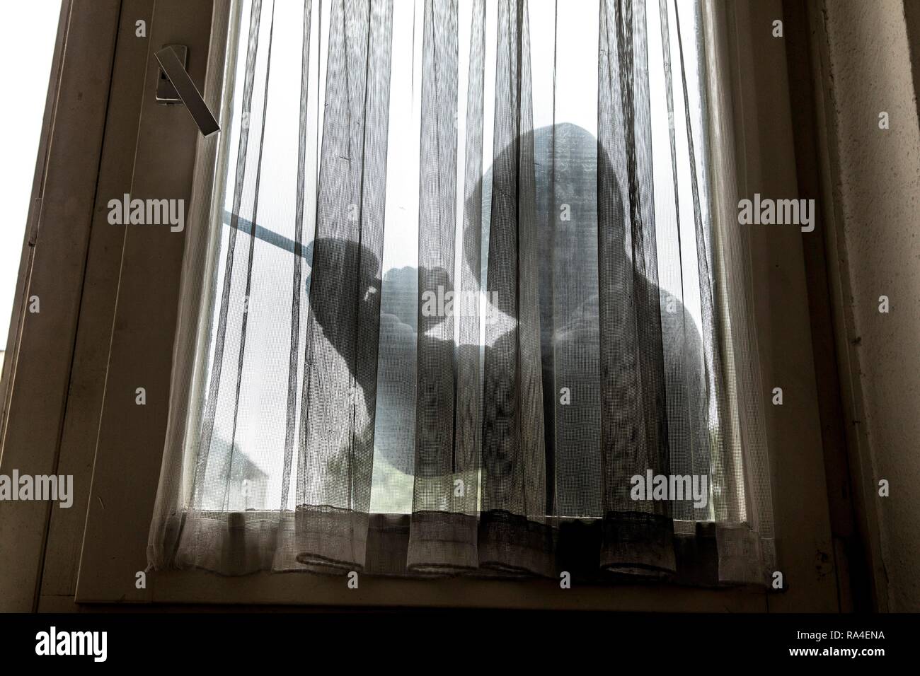 Symbol picture apartment burglary, perpetrator tries to break into an ...