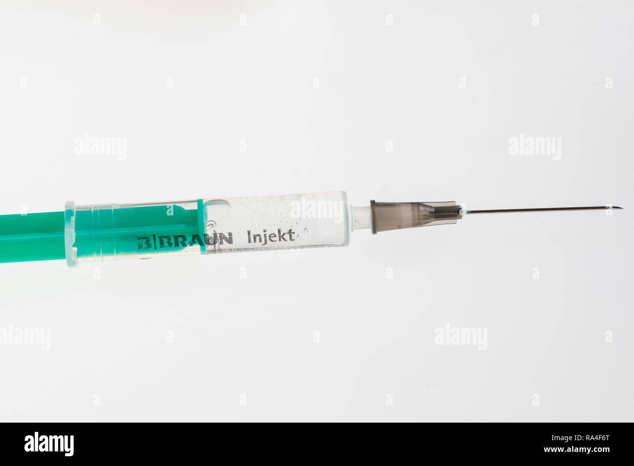 Disposable medical products, syringes, injection solutions Stock Photo ...
