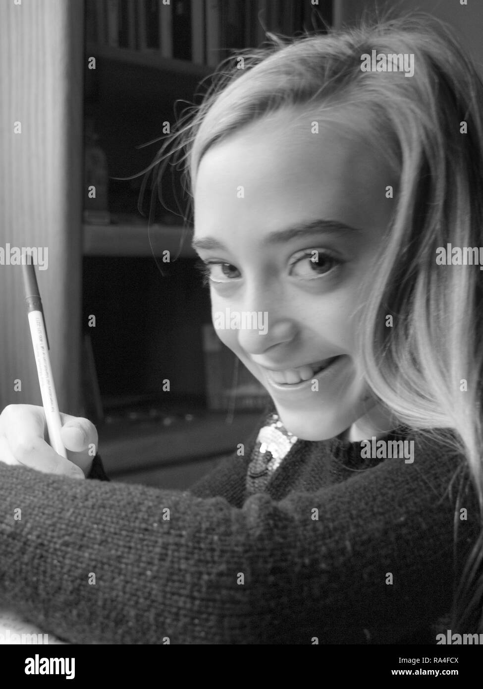 Black And White Of A 10 Year Old Girl Studying Stock Photo Alamy