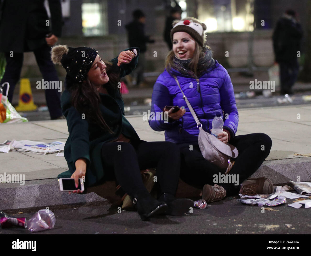 Revellers in central London, after the New Year celebrations Stock ...