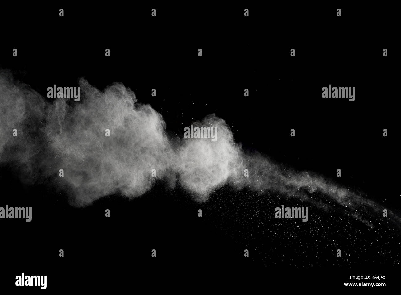 white powder explosion and splash on black background Stock Photo - Alamy