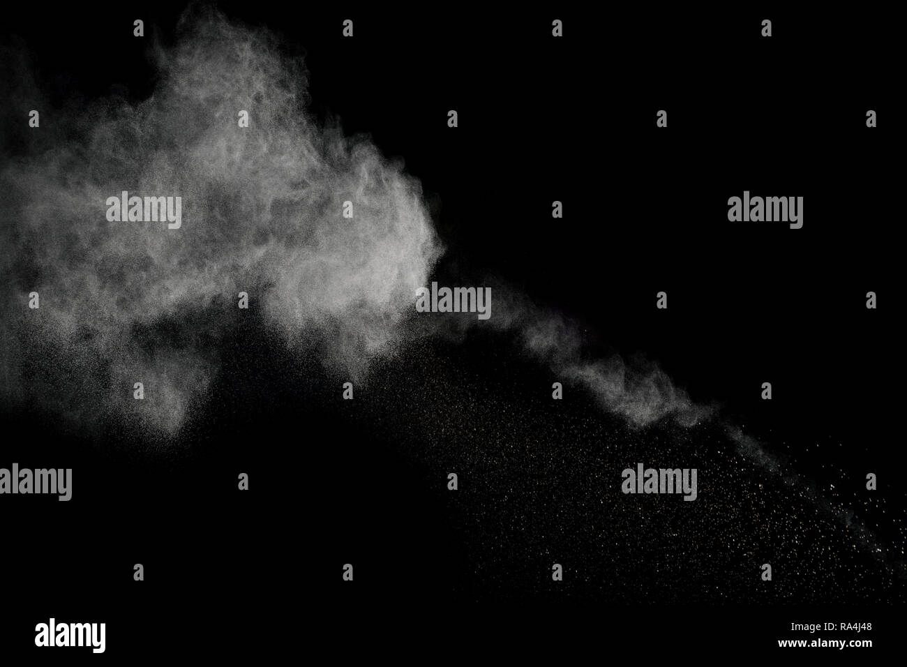 white powder explosion and splash on black background Stock Photo - Alamy