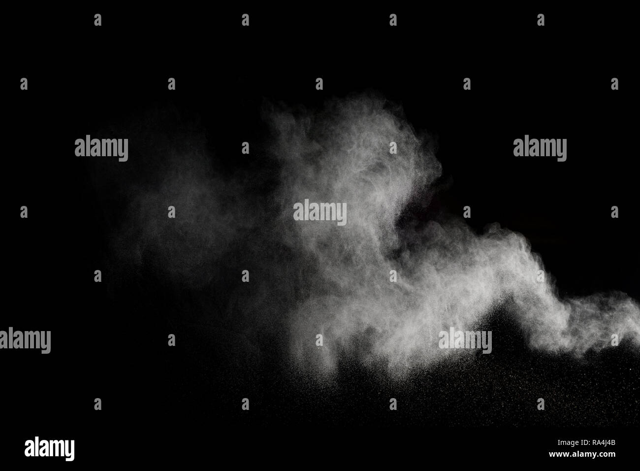 white powder explosion and splash on black background Stock Photo - Alamy