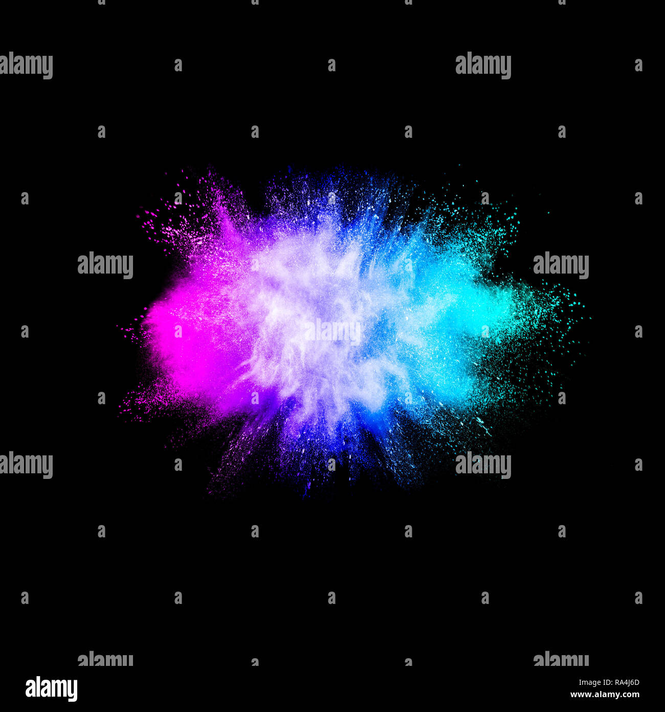 Multicolored powder explosion cloud isolated on black background ...