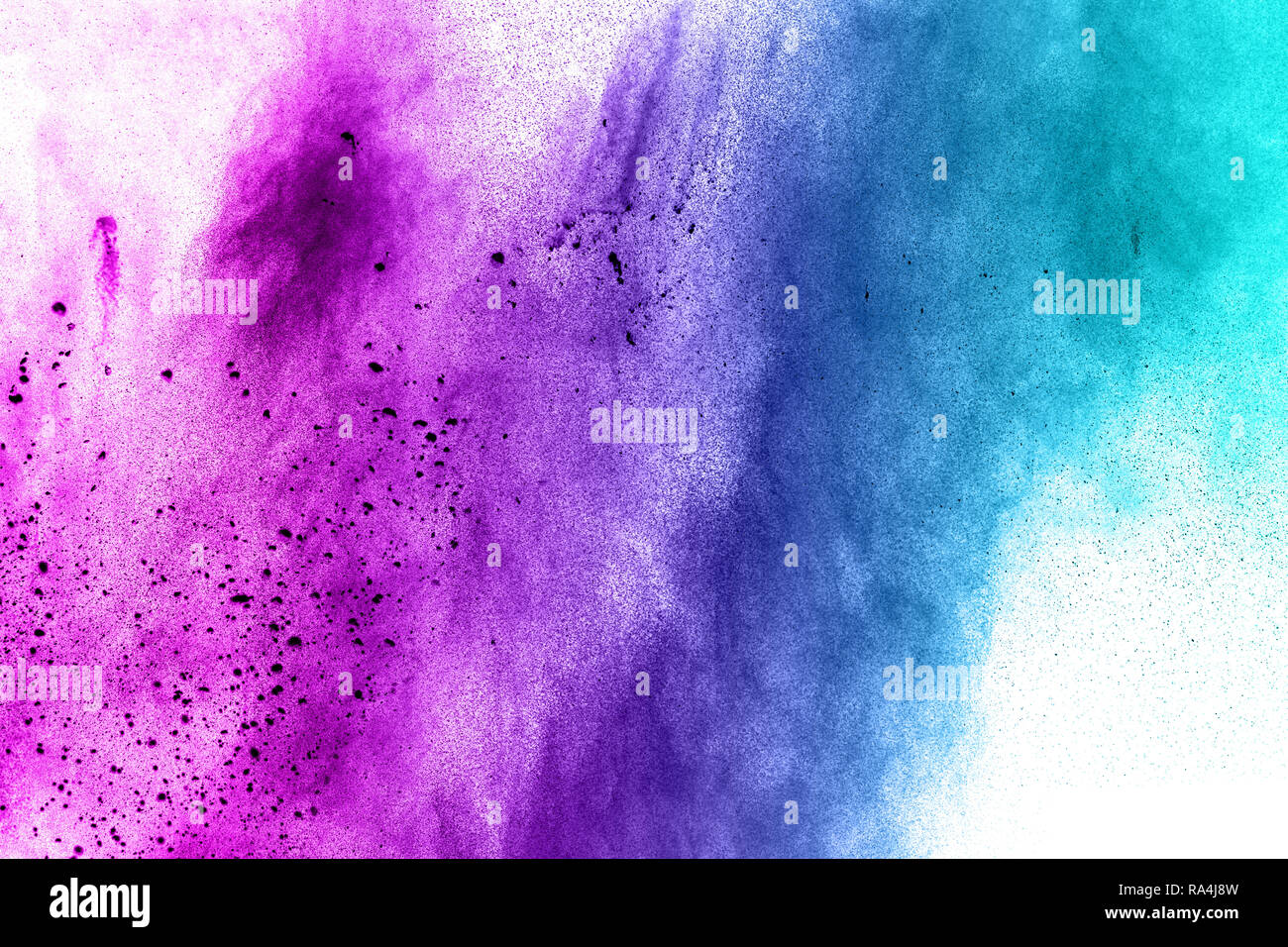Abstract blue pink dust explosion on white background. Freeze motion of ...