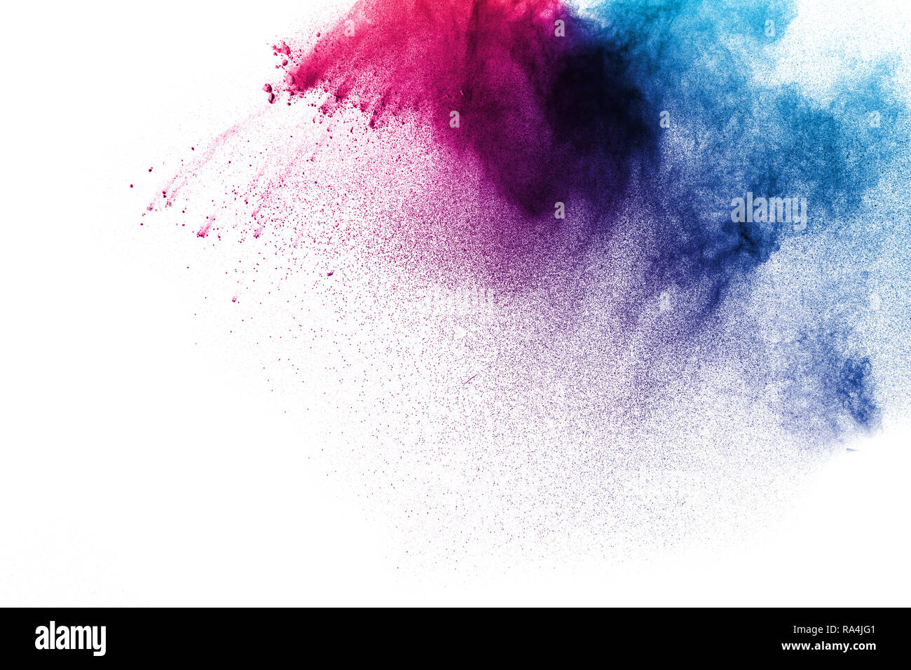 Freeze motion of colorful painted powder exploding on dark background ...