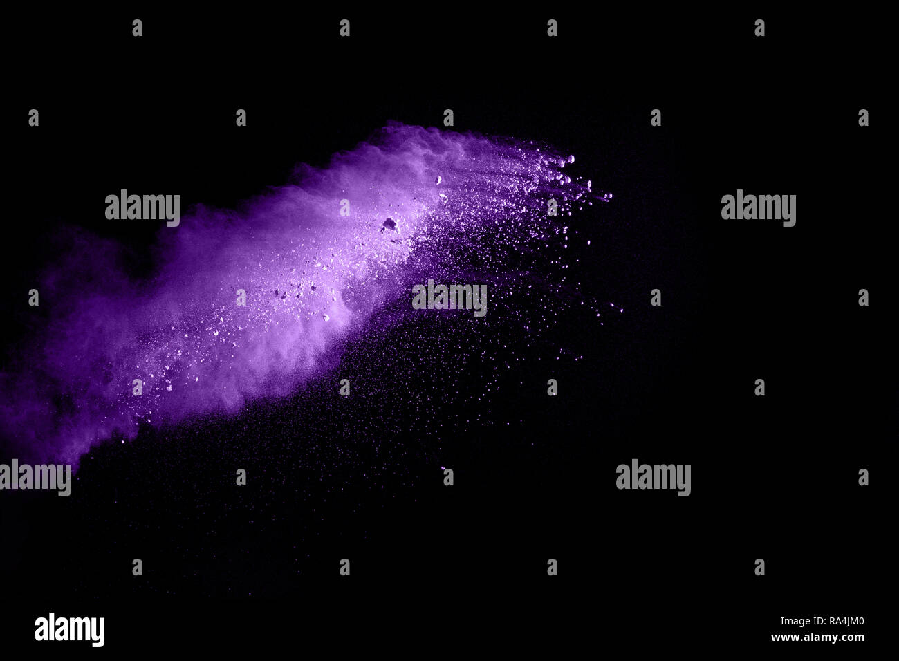 purple color powder explosion on black background. Mauve purple color ...