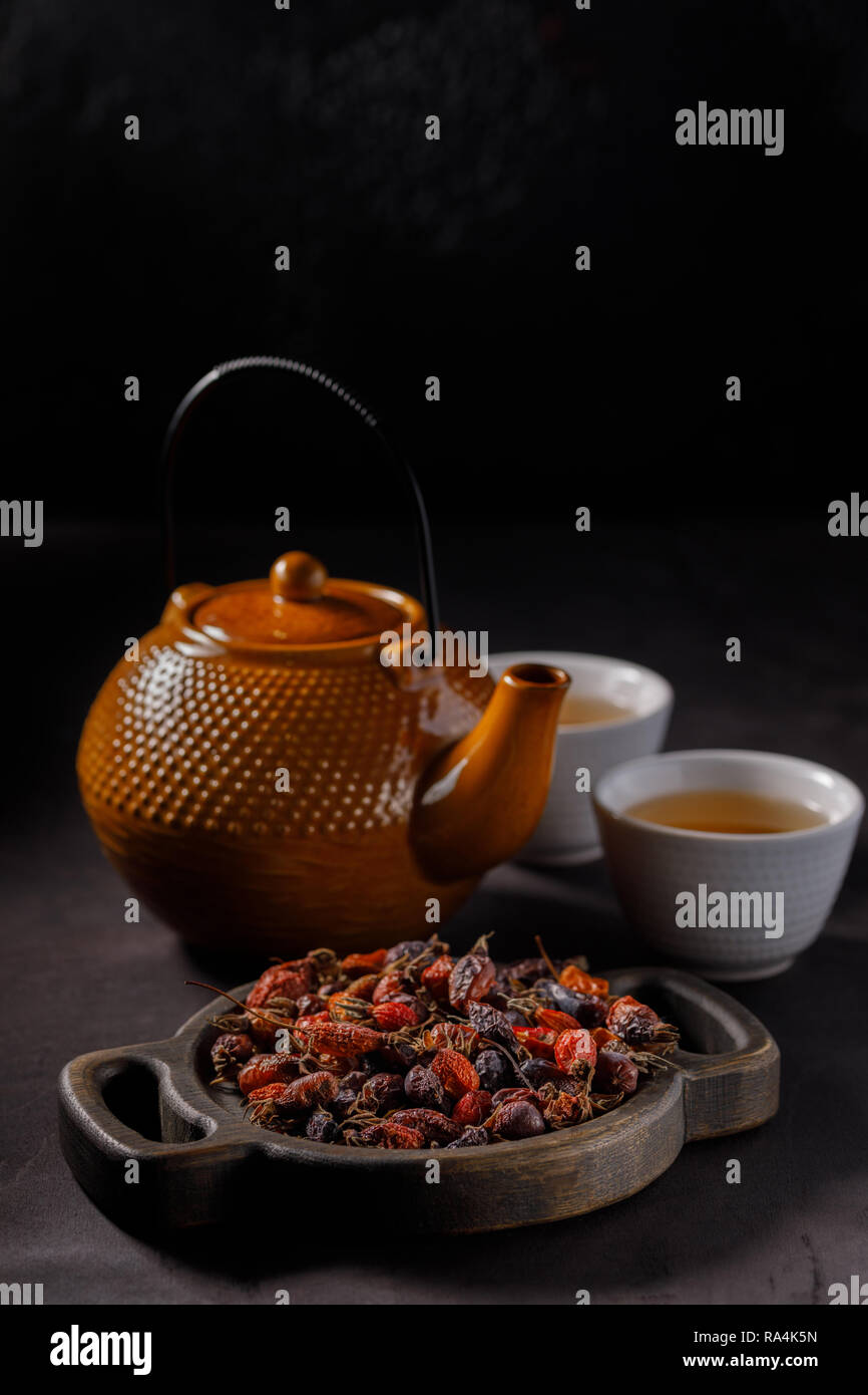 The process of brewing tea. Tea ceremony, Teapot for brewing and a cup ...