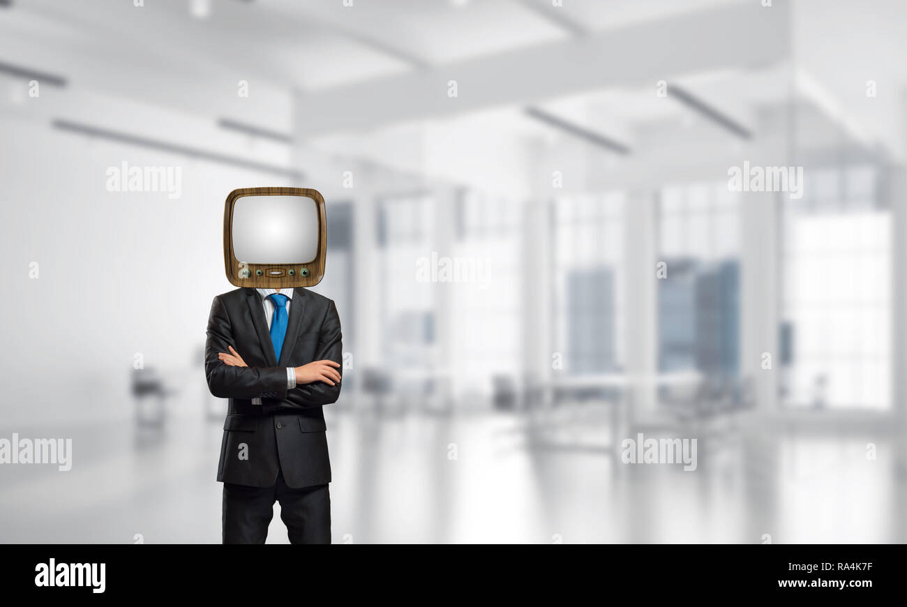 Businessman with old TV instead of head Stock Photo - Alamy