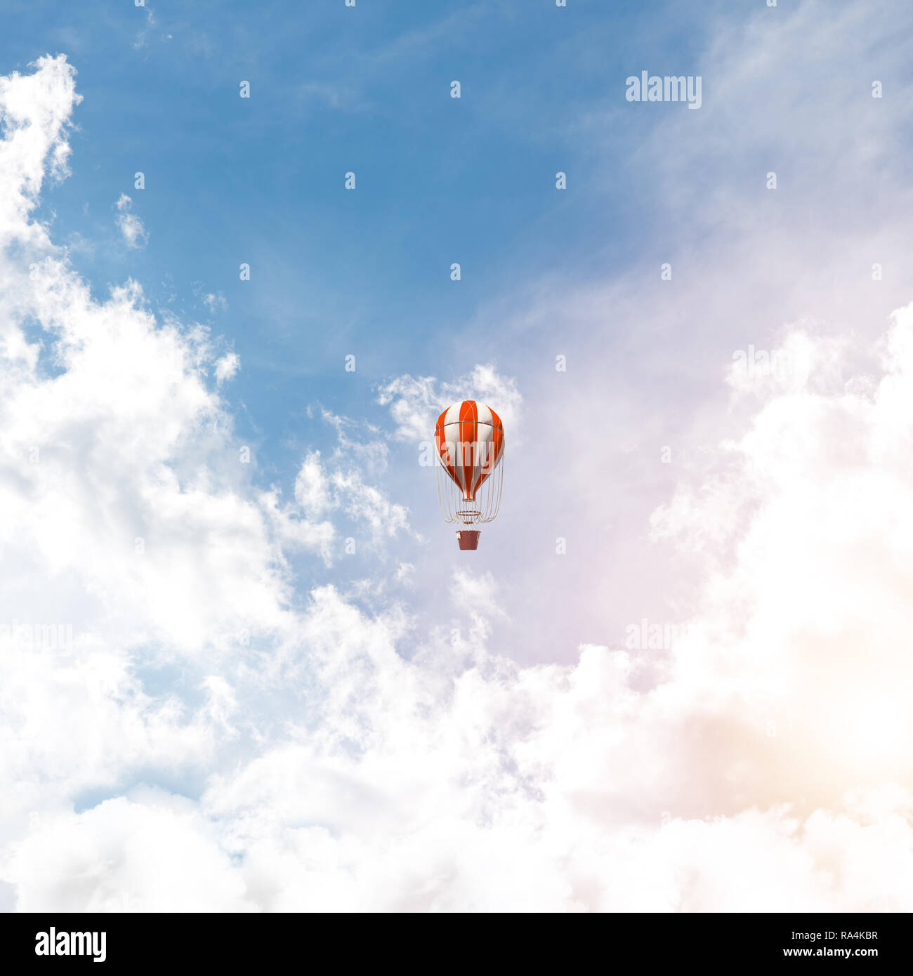 Flying hot air balloon in the air Stock Photo - Alamy