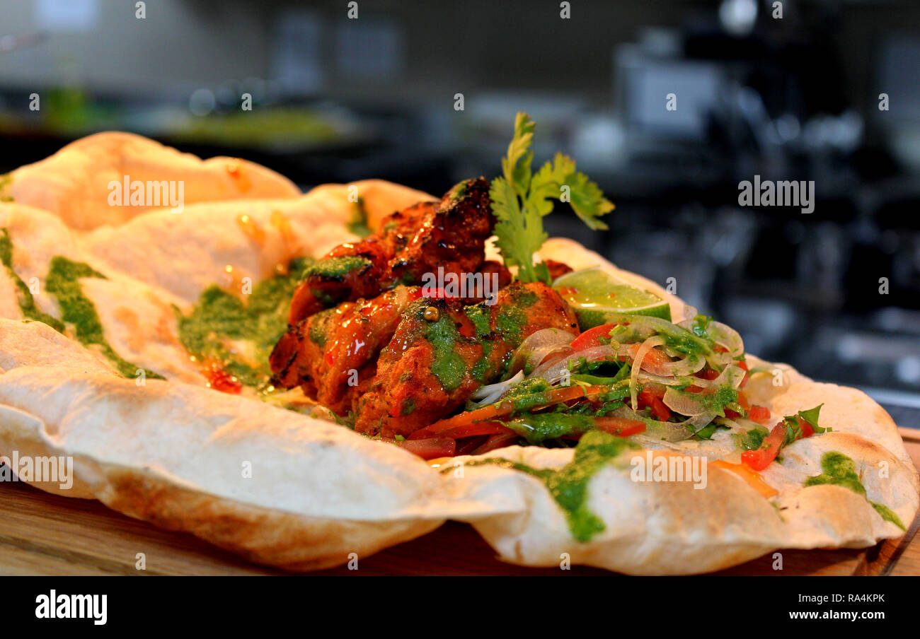 chicken tikka with roti Stock Photo - Alamy