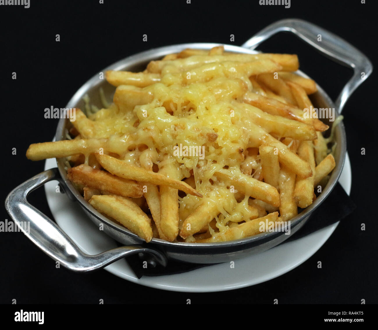 cheesy french fries Stock Photo - Alamy