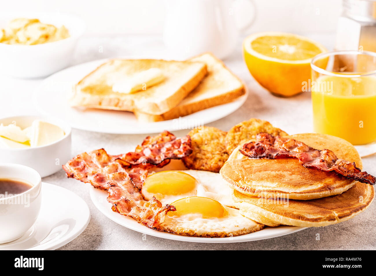 Healthy Full American Breakfast with Eggs Bacon Pancakes and Latkes ...
