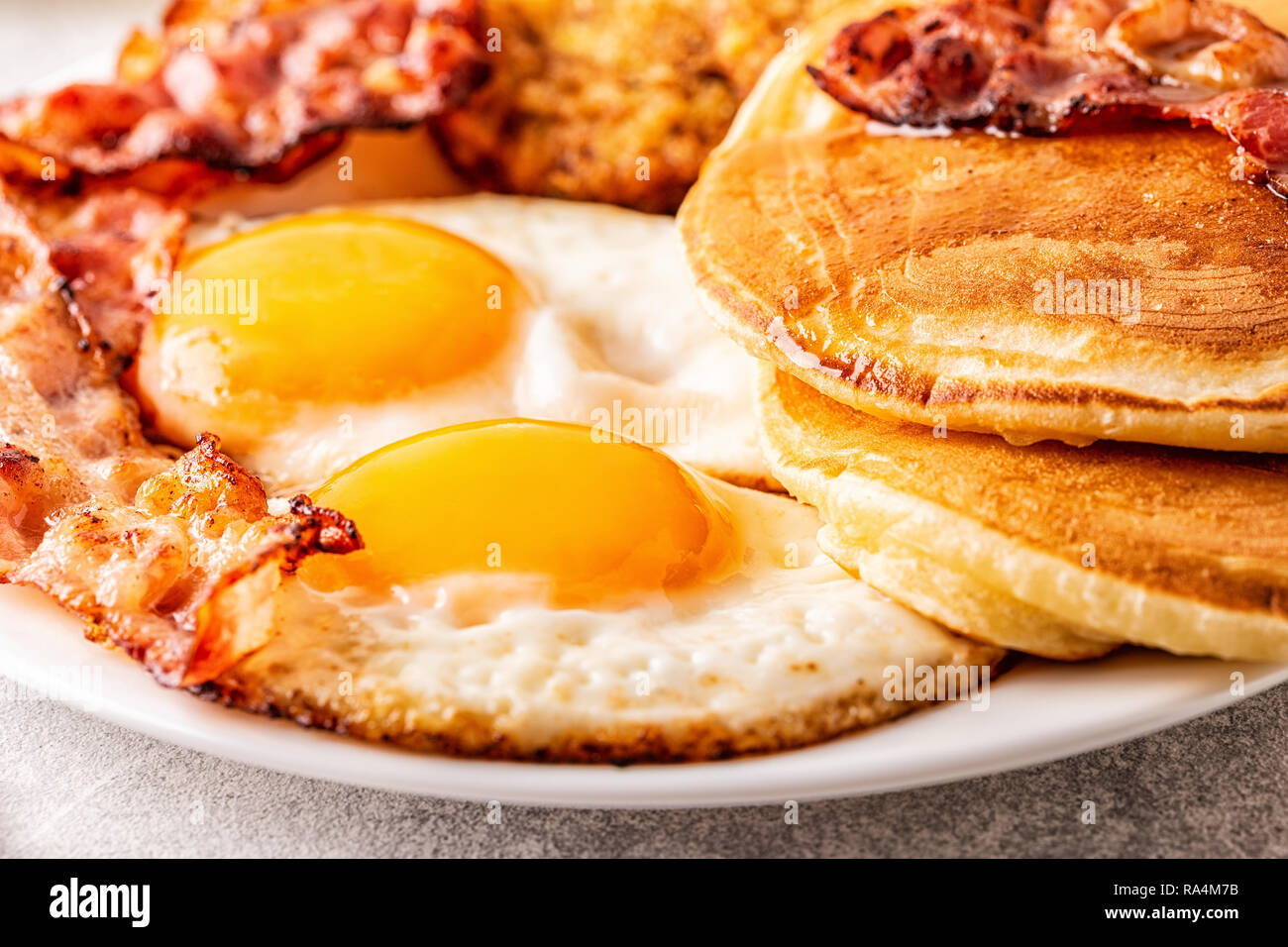 Healthy Full American Breakfast with Eggs Bacon Pancakes and Latkes ...