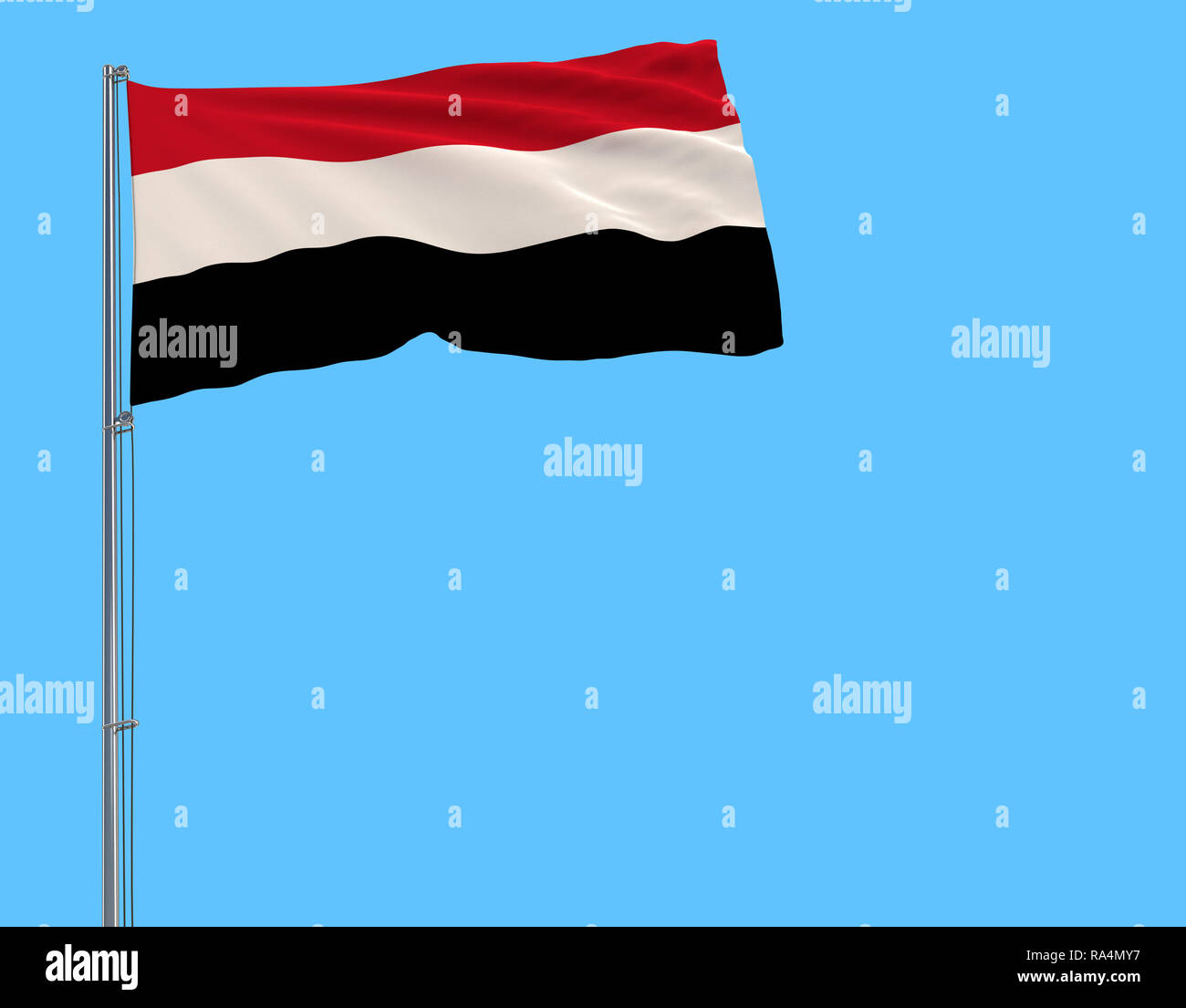 Flag of Yemen on the flagpole fluttering in the wind on a pure blue ...