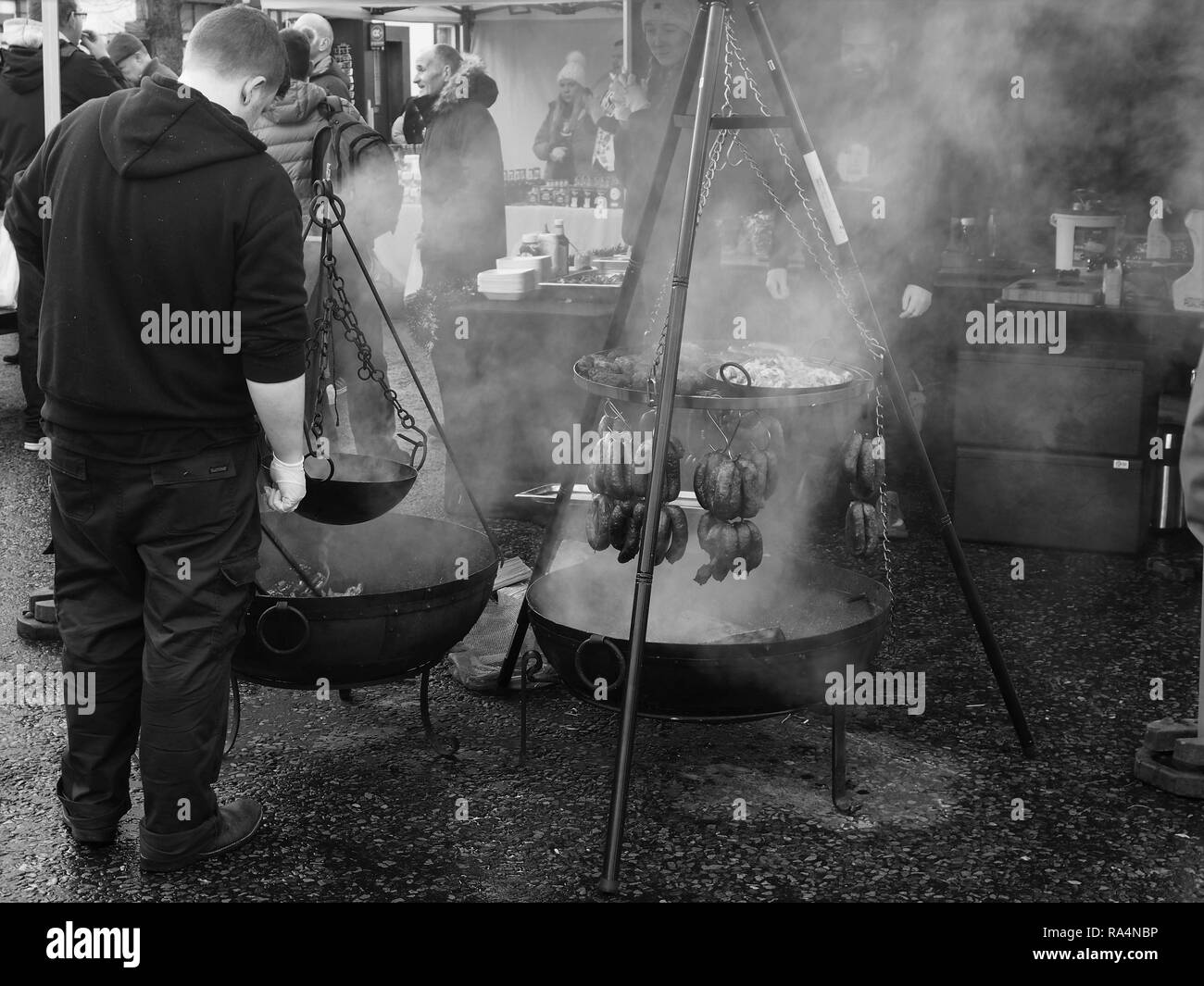 Cooking over wood Black and White Stock Photos & Images - Alamy