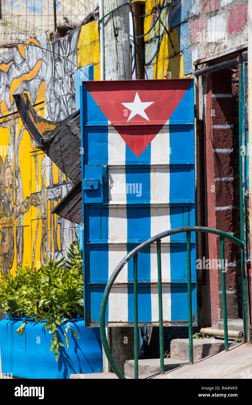 cuban flag painted on metal door in street in havana cuba Stock Photo ...