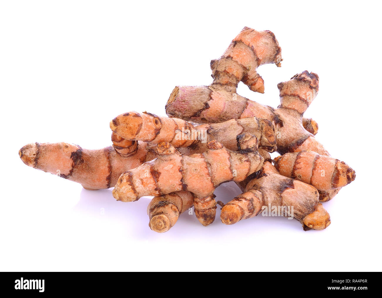 Fresh turmeric isolated on white background Stock Photo - Alamy