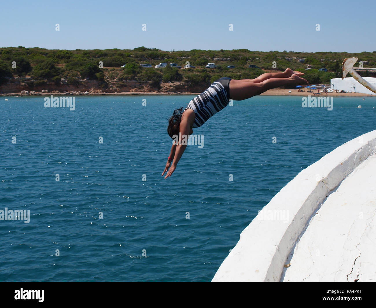 Woman Jumping Off Boat Water High Resolution Stock Photography and ...