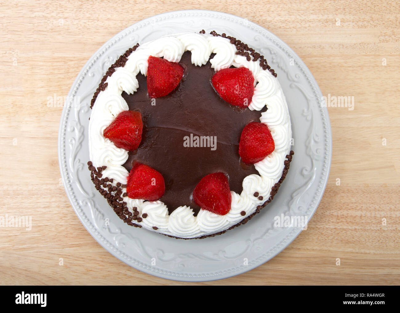 Top view flay lay Chocolate cake frosting in vanilla cream with ...