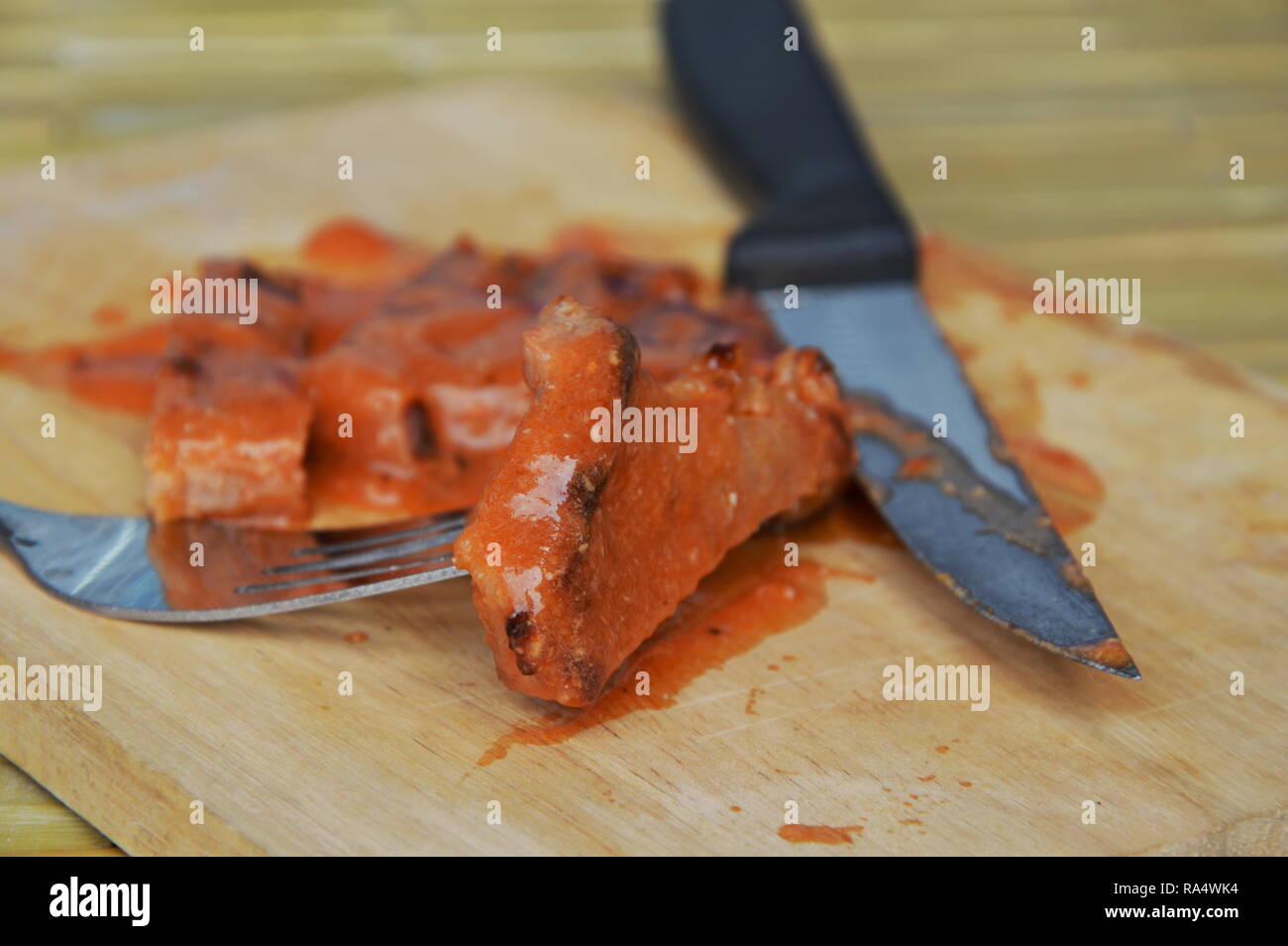 grilled pork steak cut on wooden chopping block Stock Photo - Alamy
