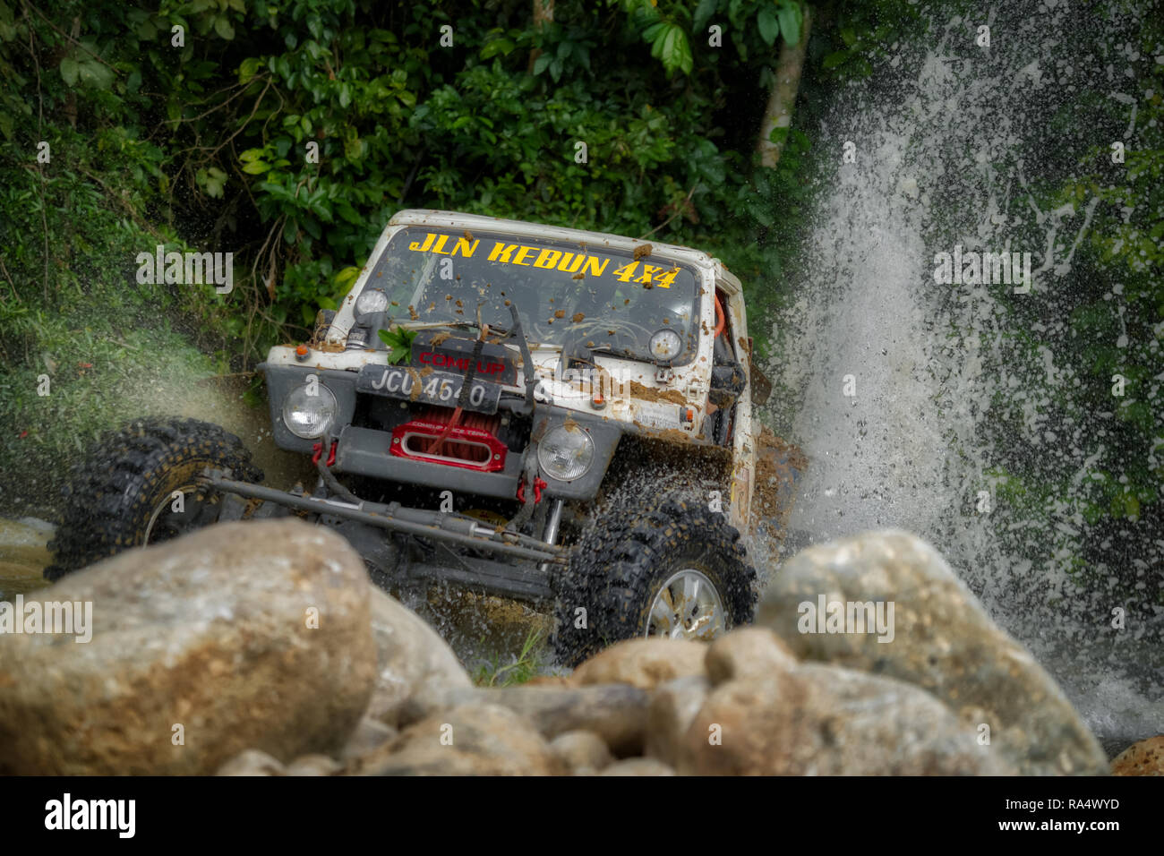 KELANTAN, MALAYSIA - NOVEMBER 2018 : 4x4 vehicle driving in the ...