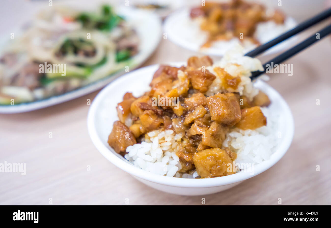 Taiwan famous food - Braised pork over rice. Soy-stewed pork rice ...