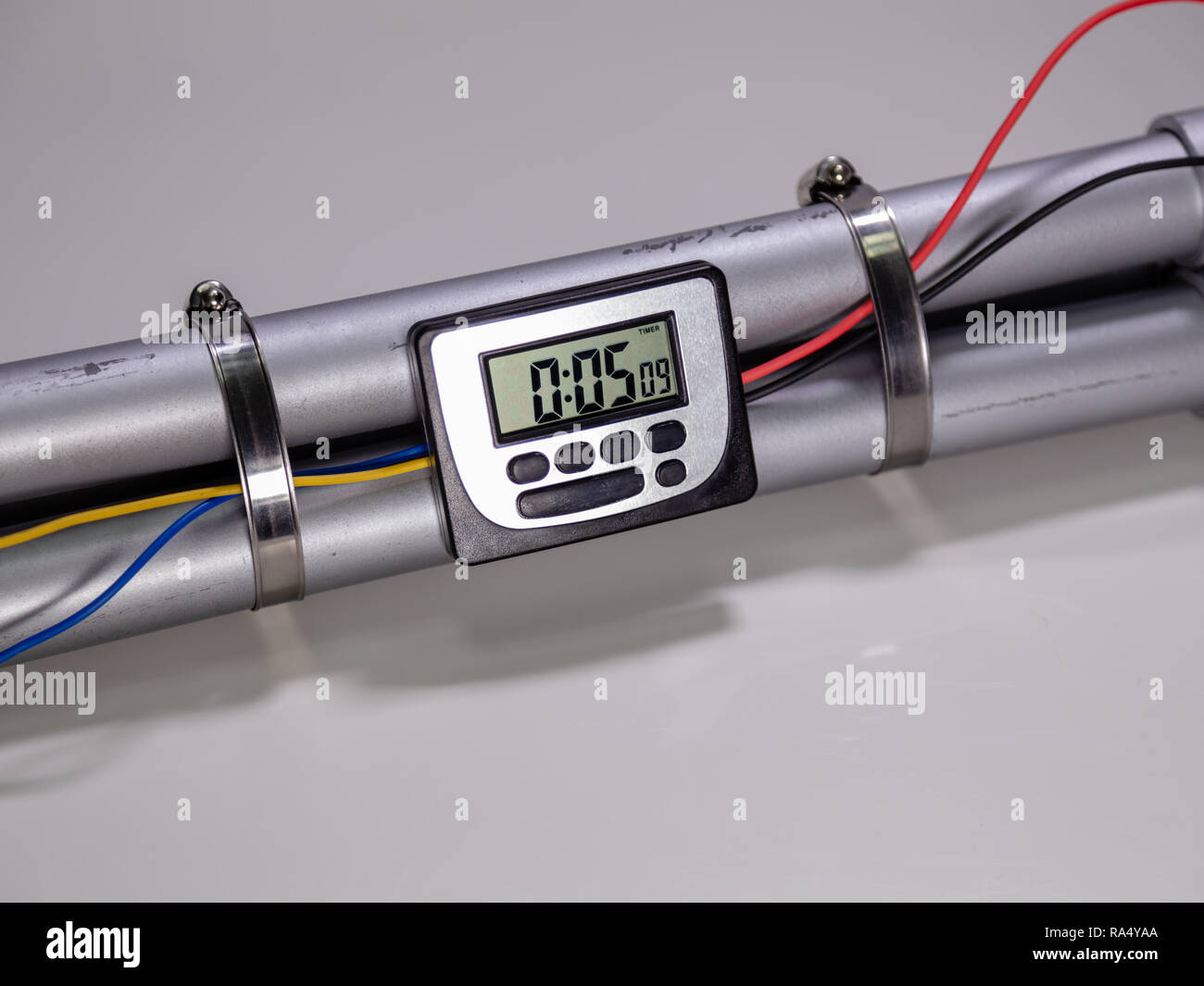 Pipe bomb with an lcd clock timer to trigger detonation on white ...