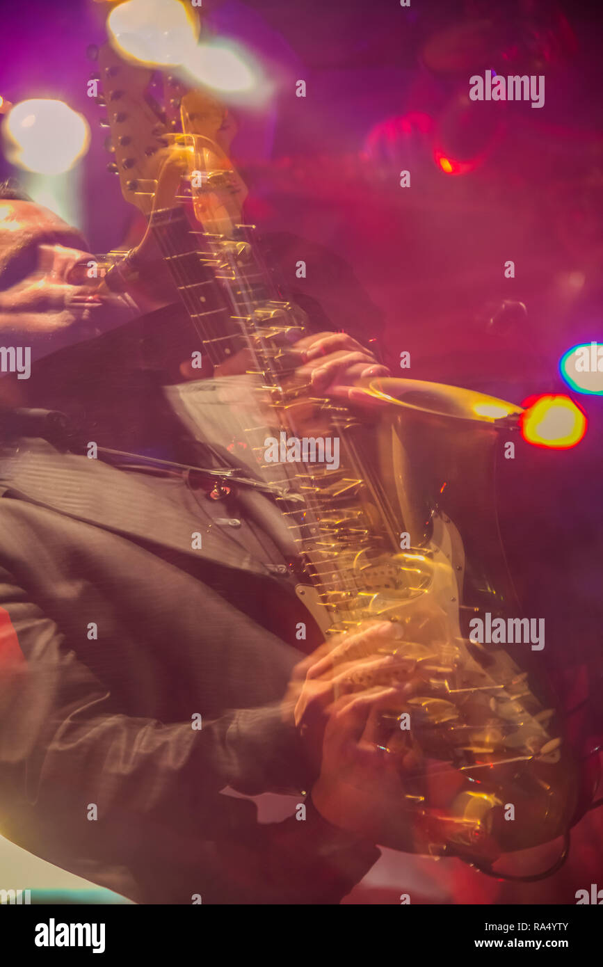 Sax player going crazy, multiples exposure art Stock Photo - Alamy