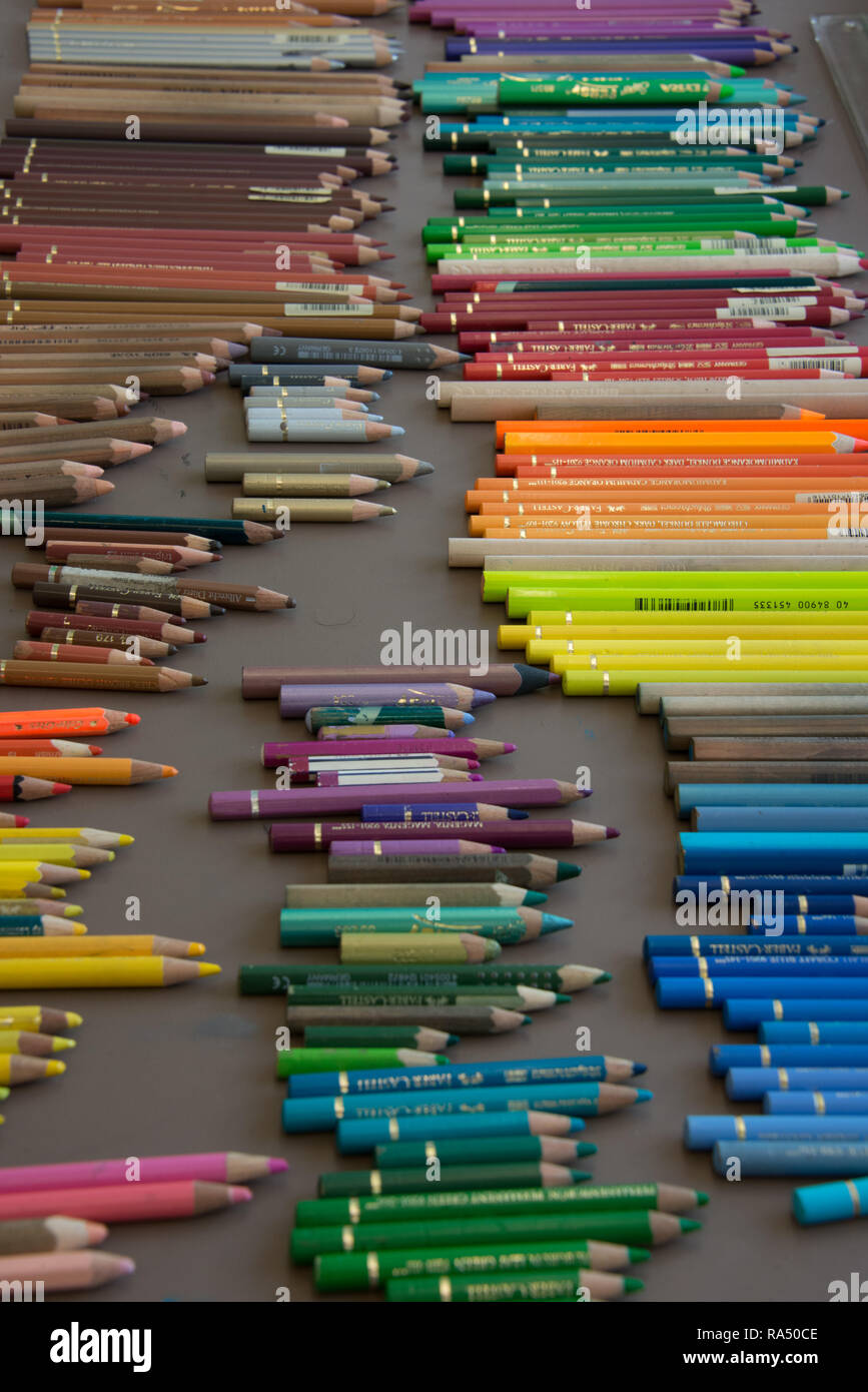 Used Color crayons arranged by artist Stock Photo - Alamy