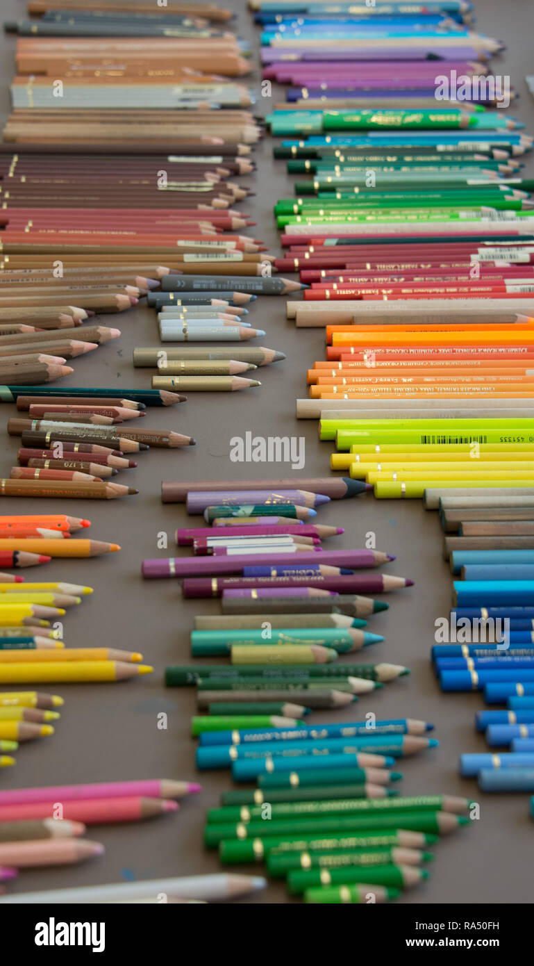 Used Color crayons arranged by artist Stock Photo - Alamy