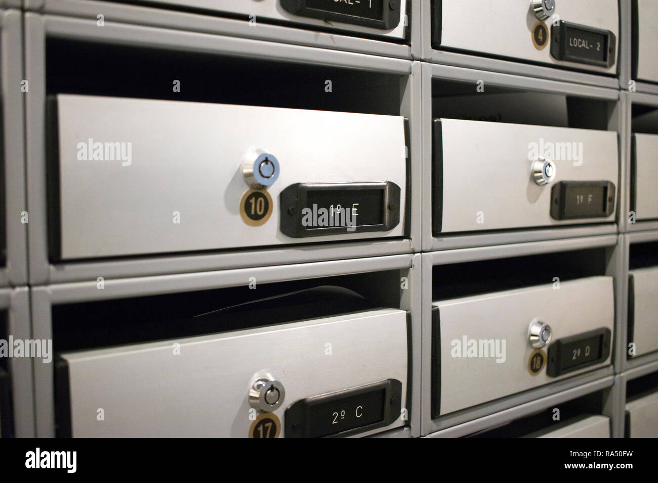 Residential appartment block building interior letter boxes with ...