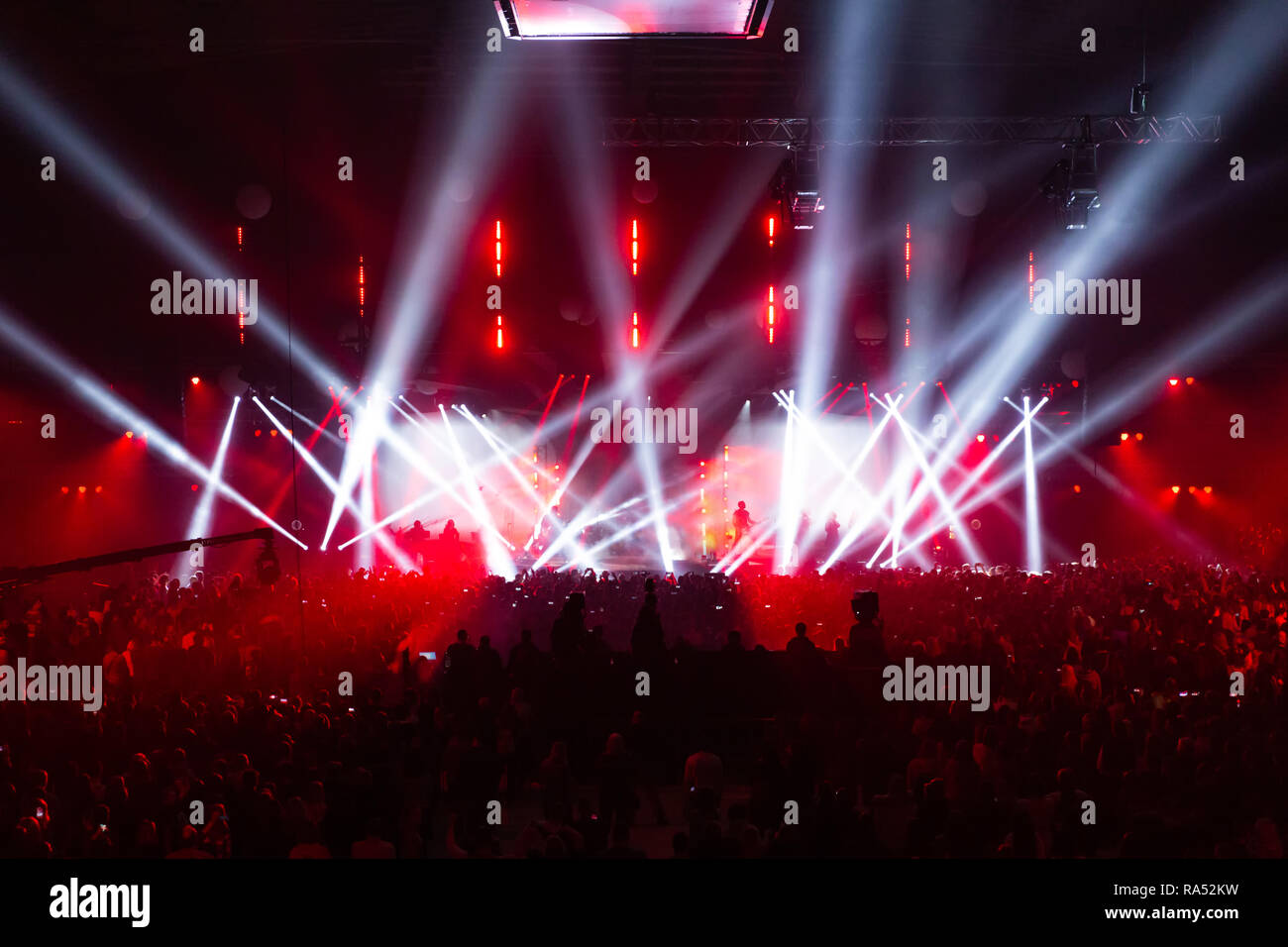 Stage illuminated by beautiful rays of lighting equipment Stock Photo ...
