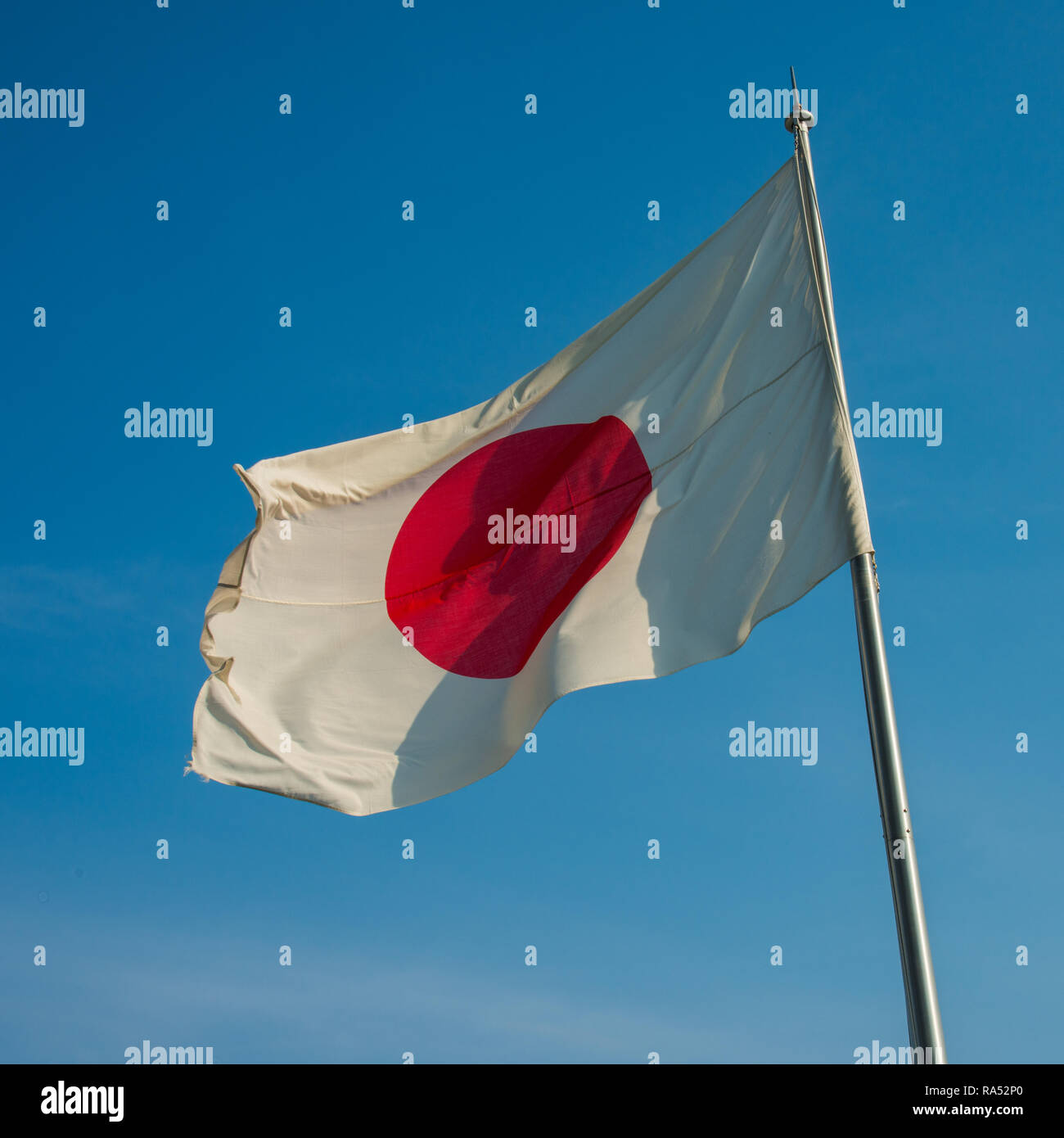 Japan flag waving red white Stock Photo - Alamy