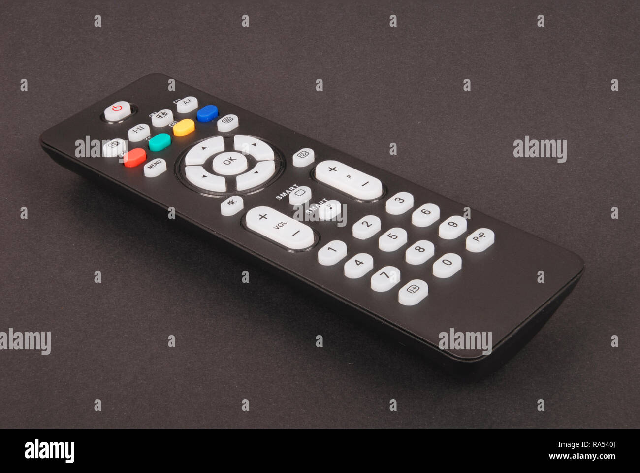 Black remote control for TV isolated on black background Stock Photo ...