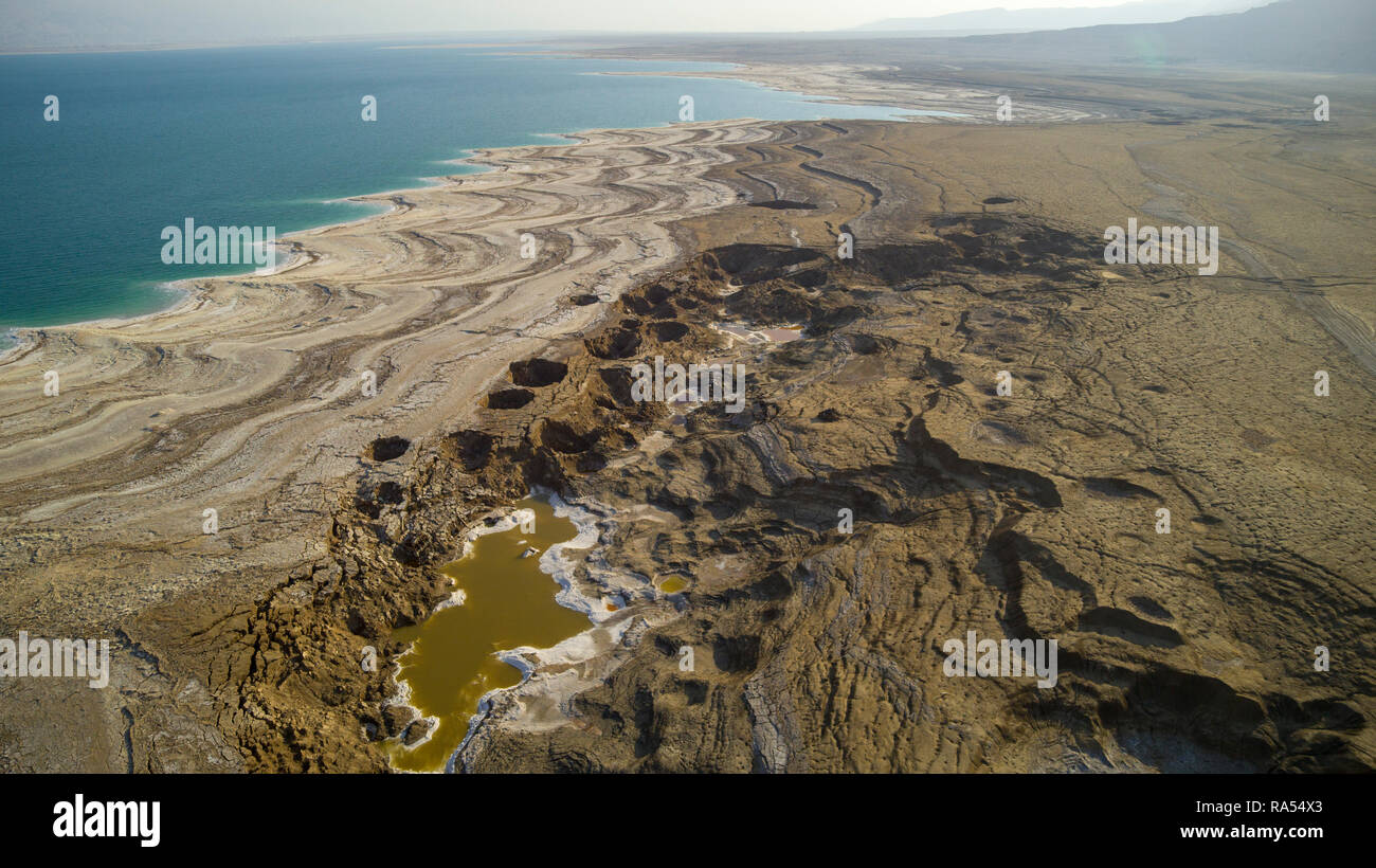 Aerial Photography with a drone. Elevated view of sink holes on the ...