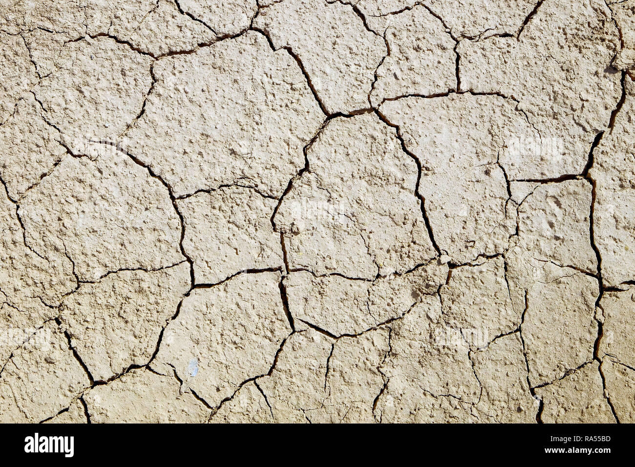 Cracked ground caused by drought in summer on top-view, detail textured ...