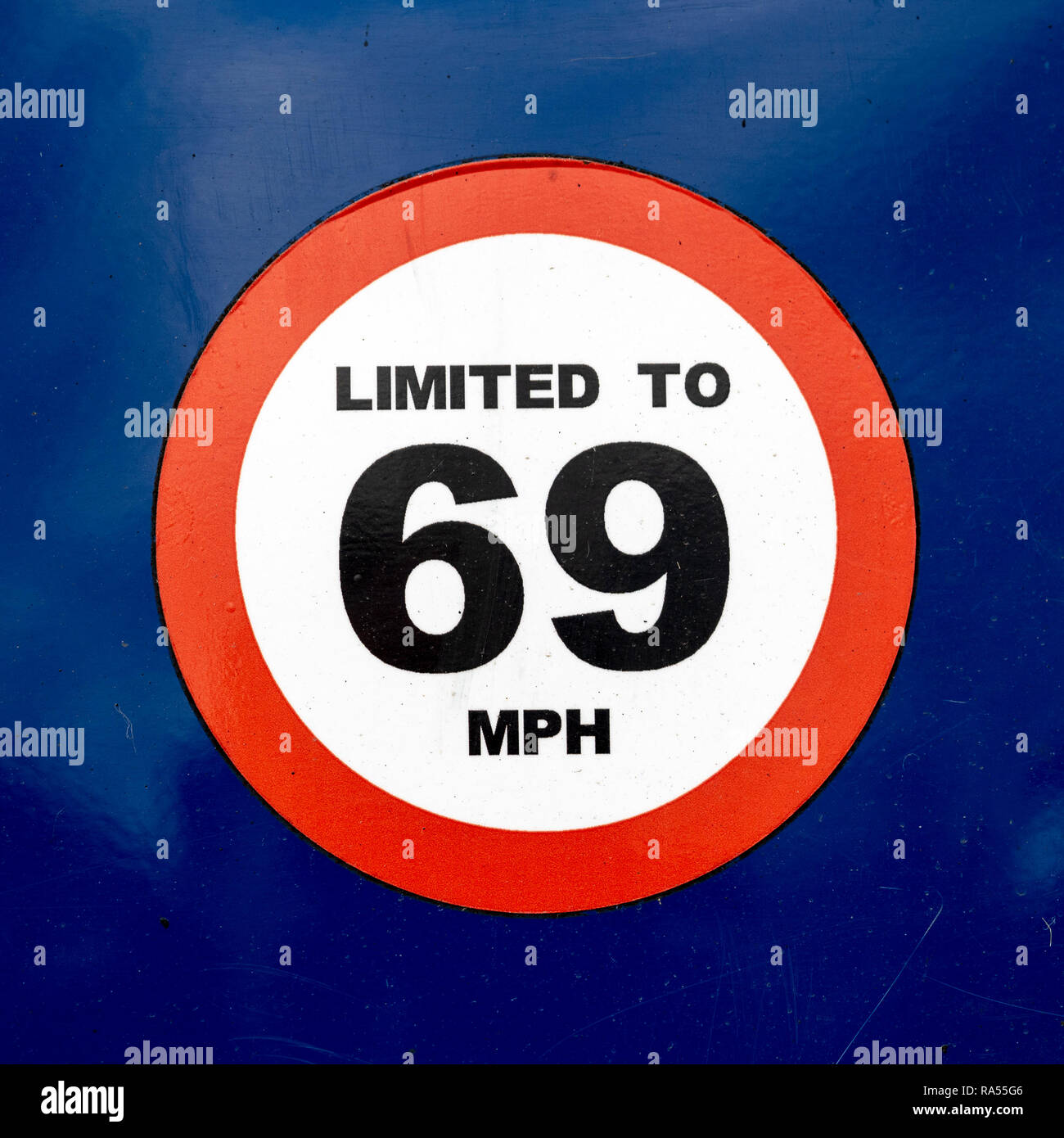 Vehicle limited to 69 miles per hour sticker Stock Photo - Alamy