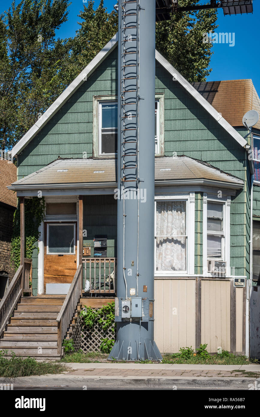 Residential building with billboard pole in front yard Stock Photo - Alamy