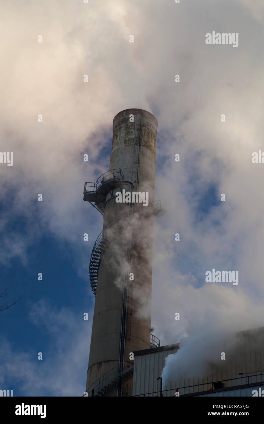 Smoke stack billowing steam Stock Photo - Alamy