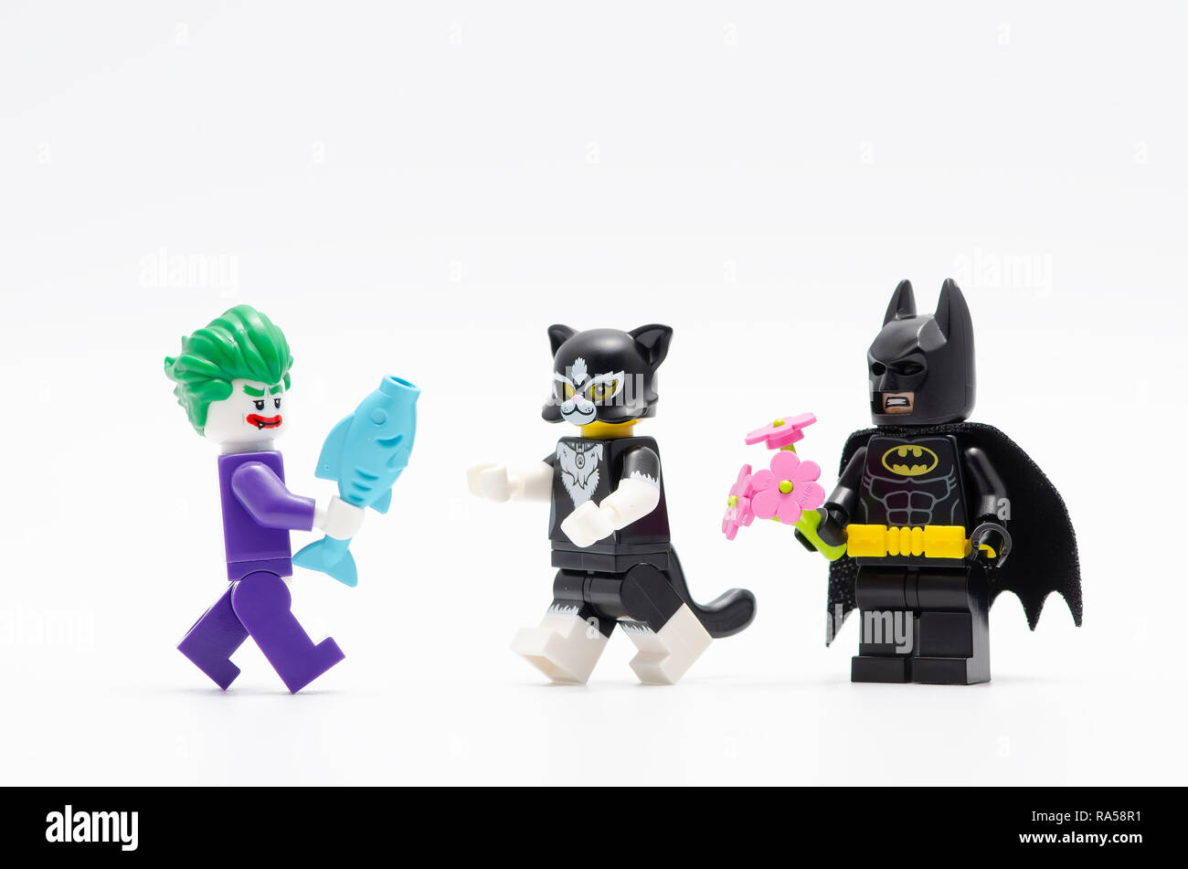 Batman giving flower and joker giving fish to cat women. Lego ...