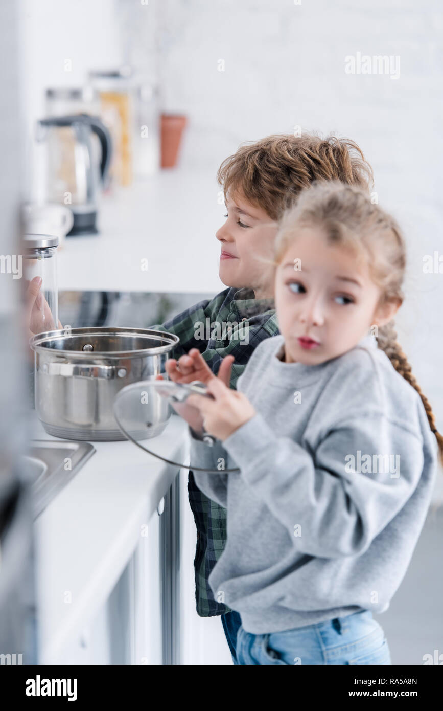 Brother washing sister hi-res stock photography and images - Alamy