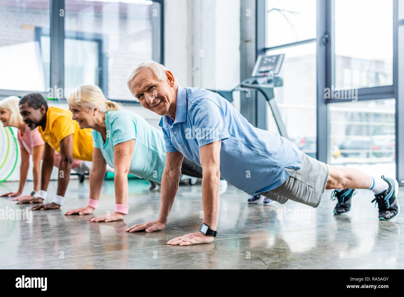 Happy sportspeople hi-res stock photography and images - Alamy