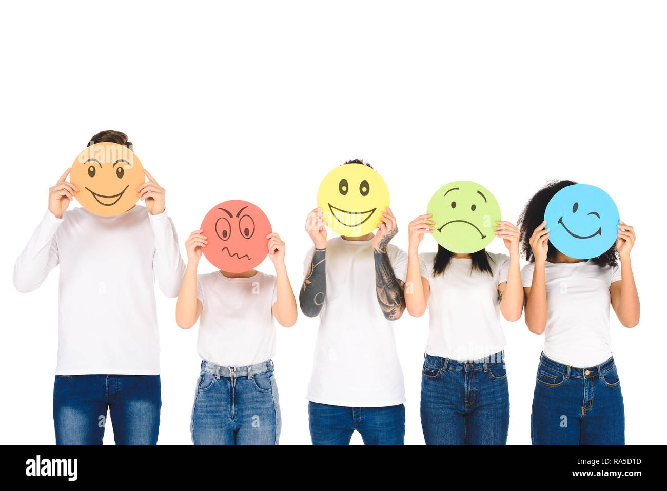 young multicultural friends holding colored cards with emotions ...