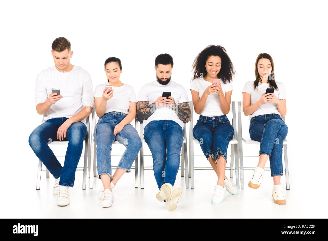 People sitting on chairs hi-res stock photography and images - Alamy