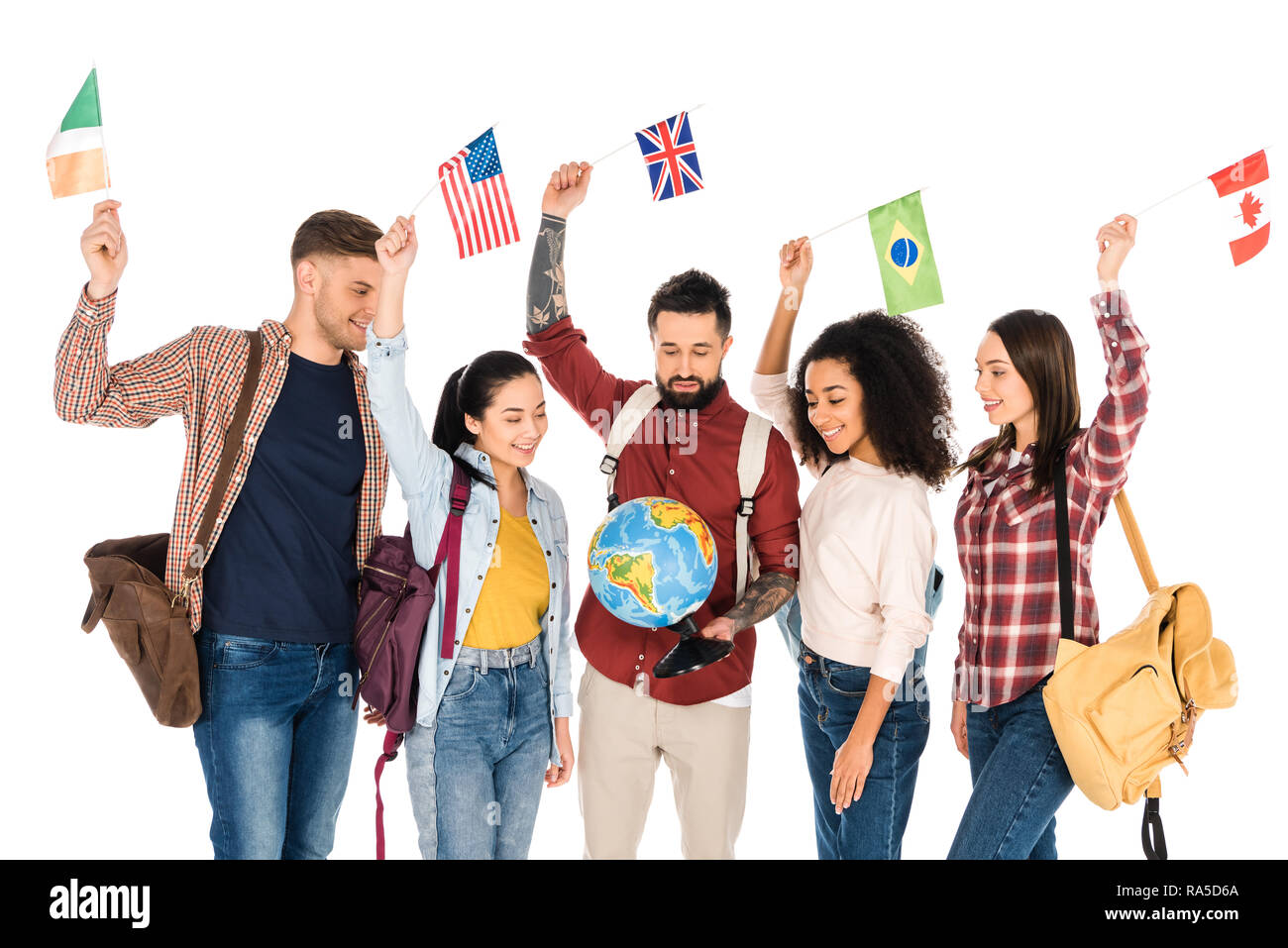 multiethnic group of people standing with backpacks and looking at ...