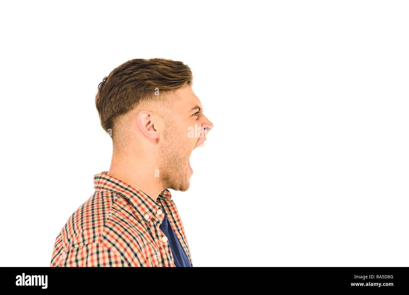 Side profile young man screaming hi-res stock photography and images ...
