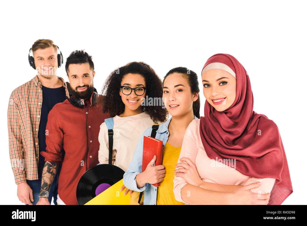 multicultural group of young people standing and smiling isolated on ...