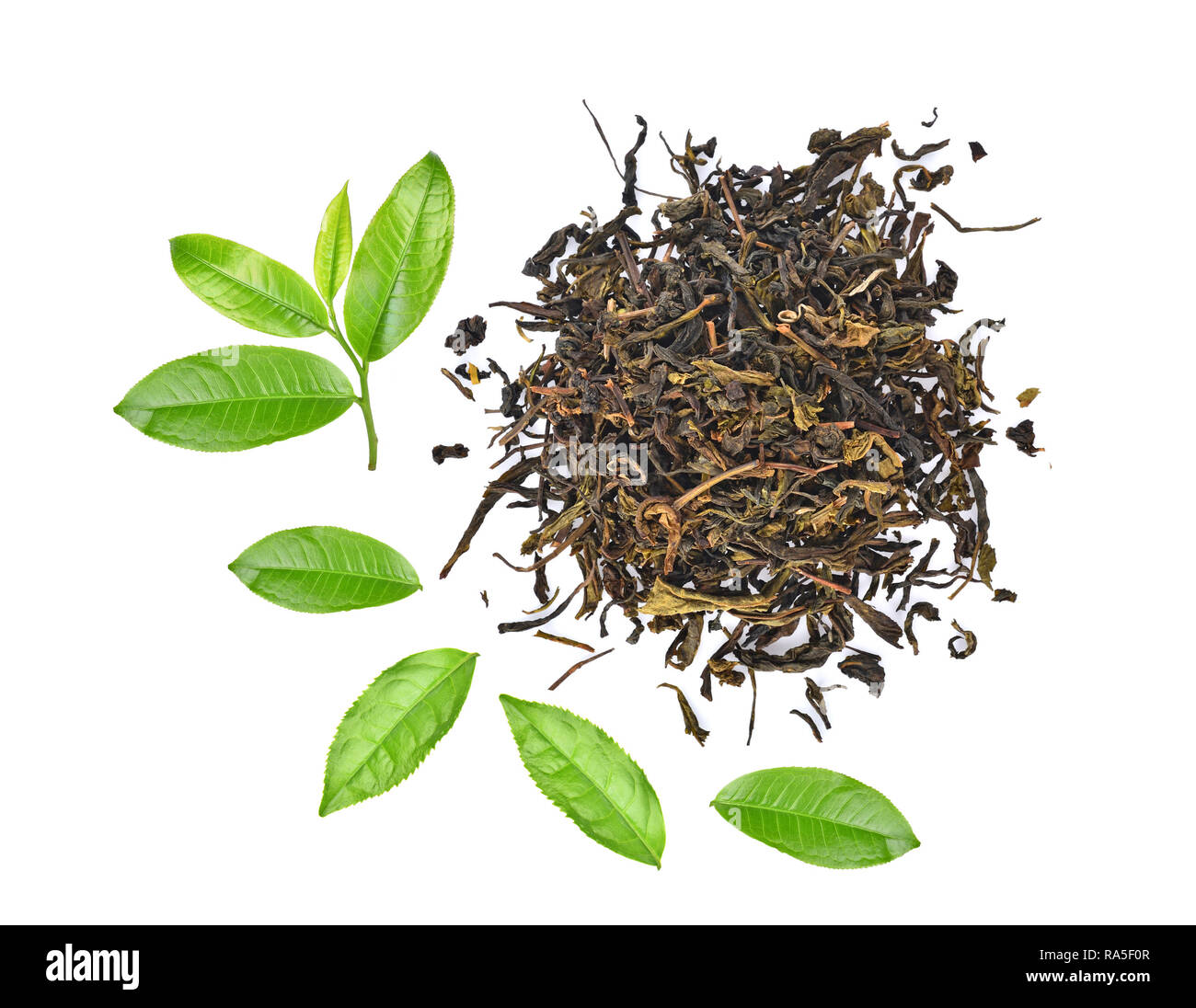 Top view of powder green tea and green tea leaf isolated on white ...